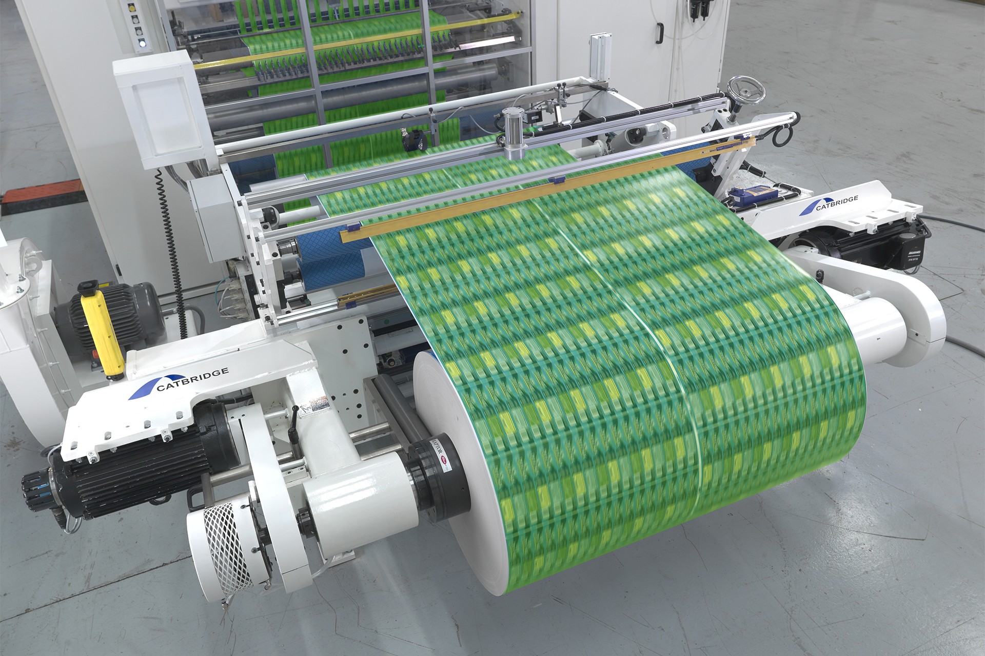 Model 685 Shaftless Floor Pickup Unwind With Infeed - Catbridge